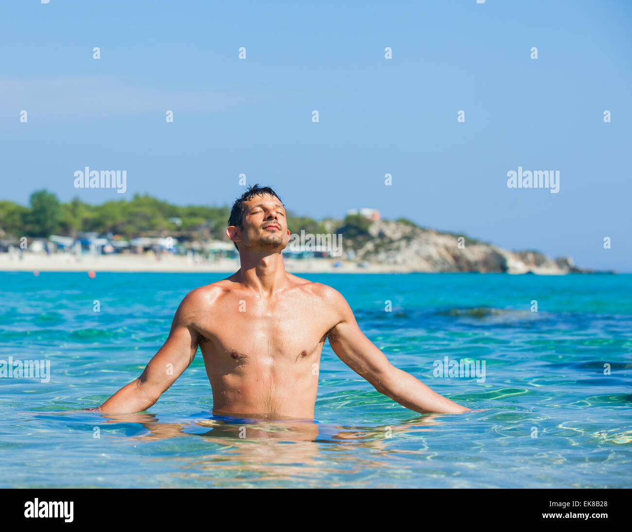 Young man in sea Stock Photo - Alamy