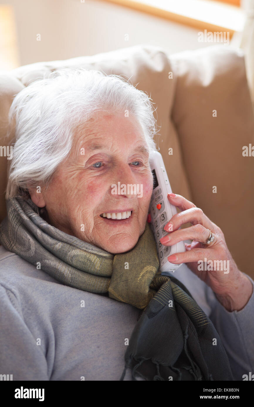Old lady sitting in chair hi-res stock photography and images - Alamy
