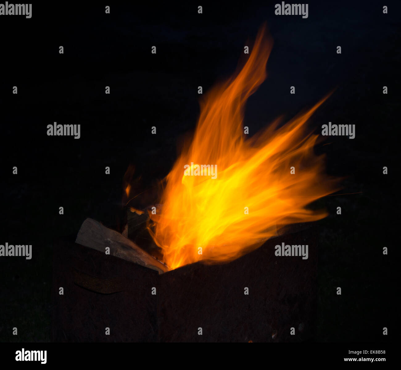 Fire in grill Stock Photo - Alamy