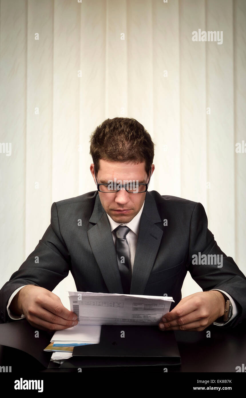 Analyzing a document Stock Photo - Alamy