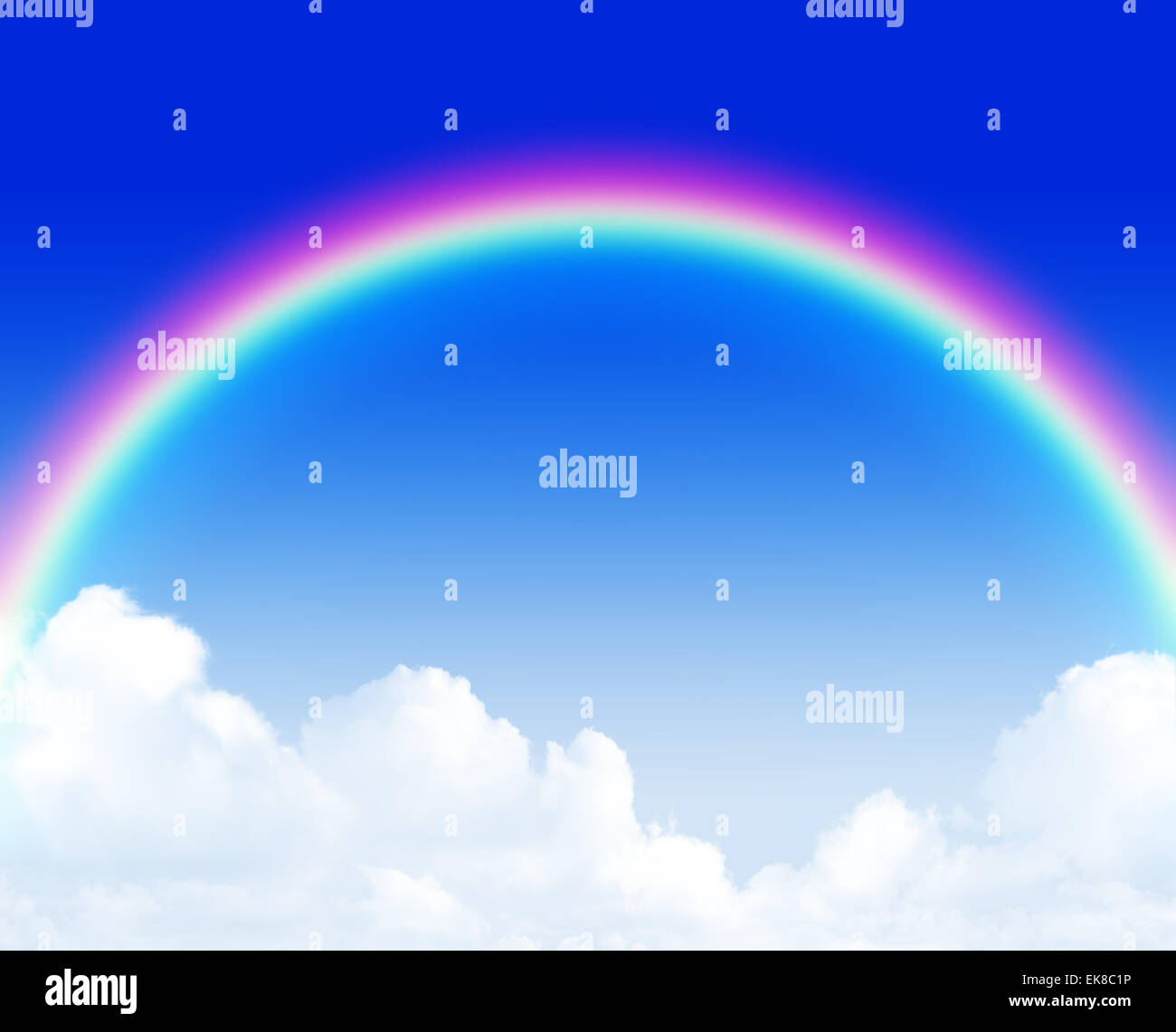 Beautiful rainbow over blue sky Stock Photo - Alamy