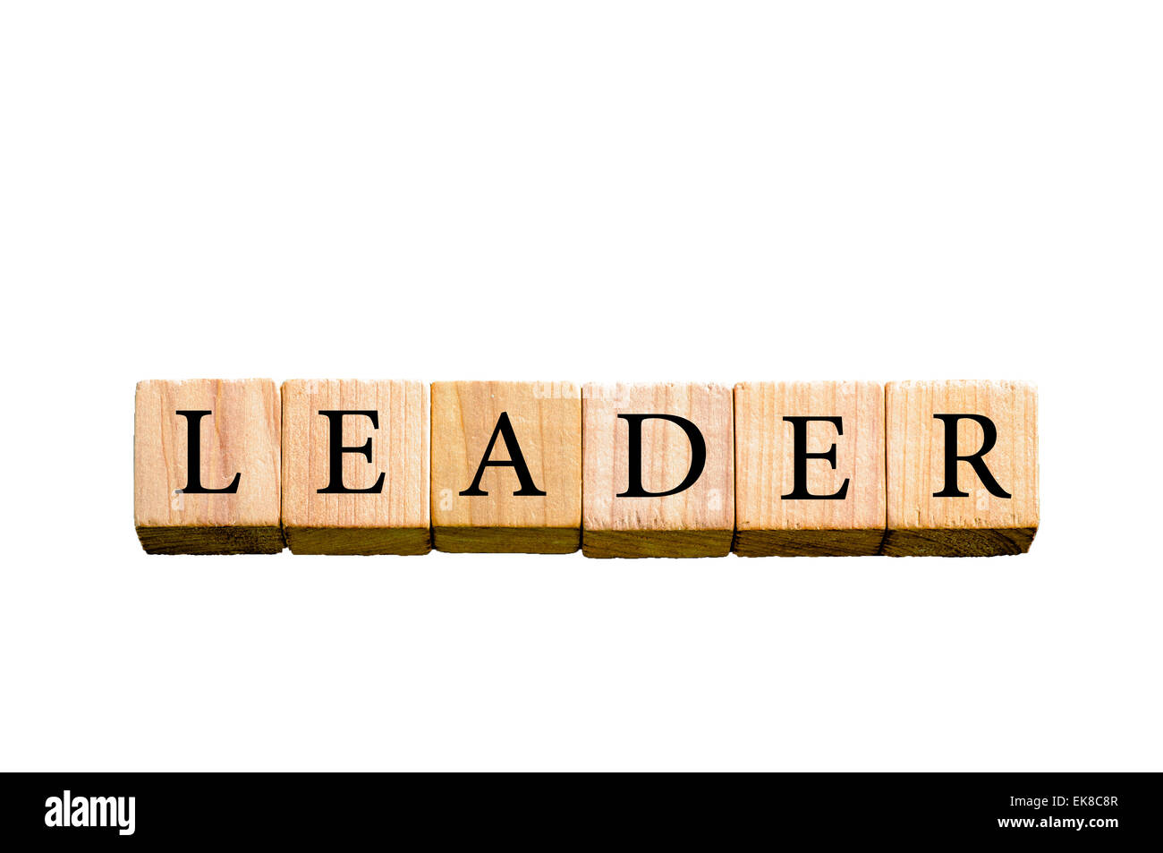 Word LEADER. Wooden small cubes with letters isolated on white ...