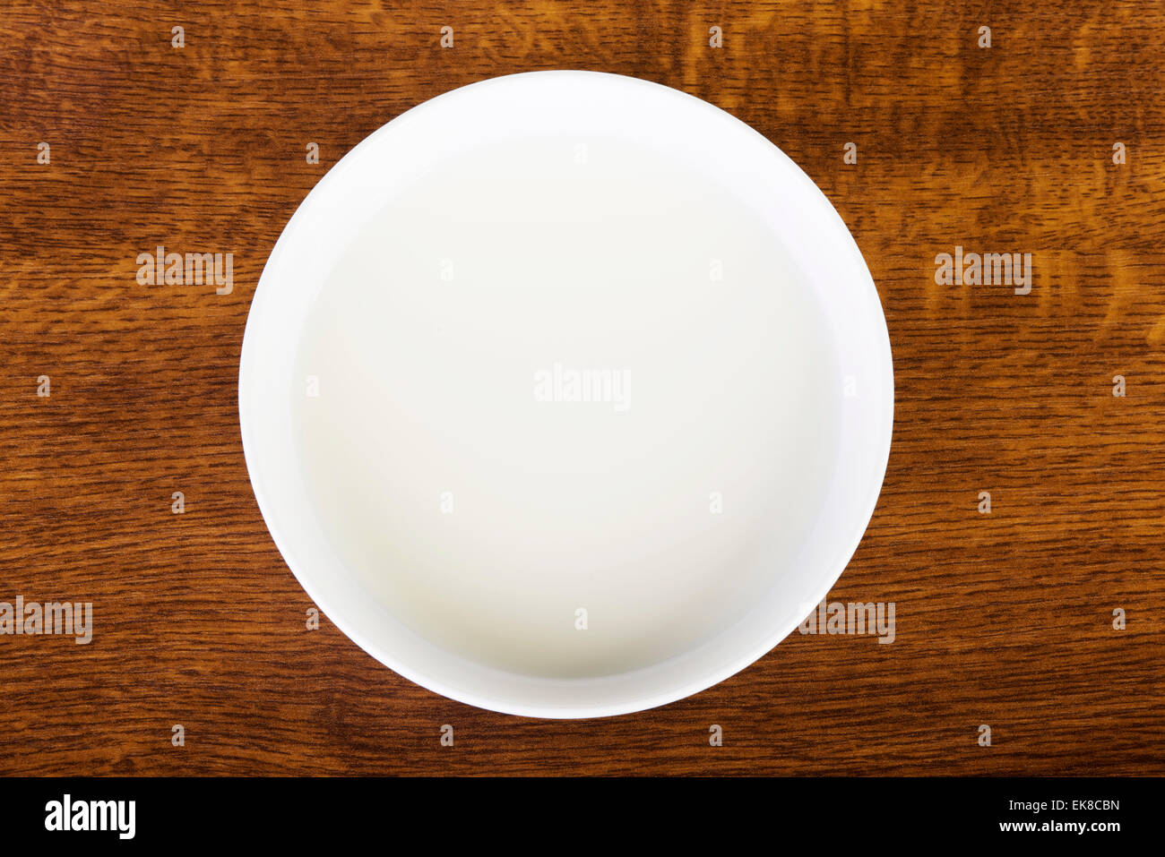 Bowl of milk Stock Photo - Alamy