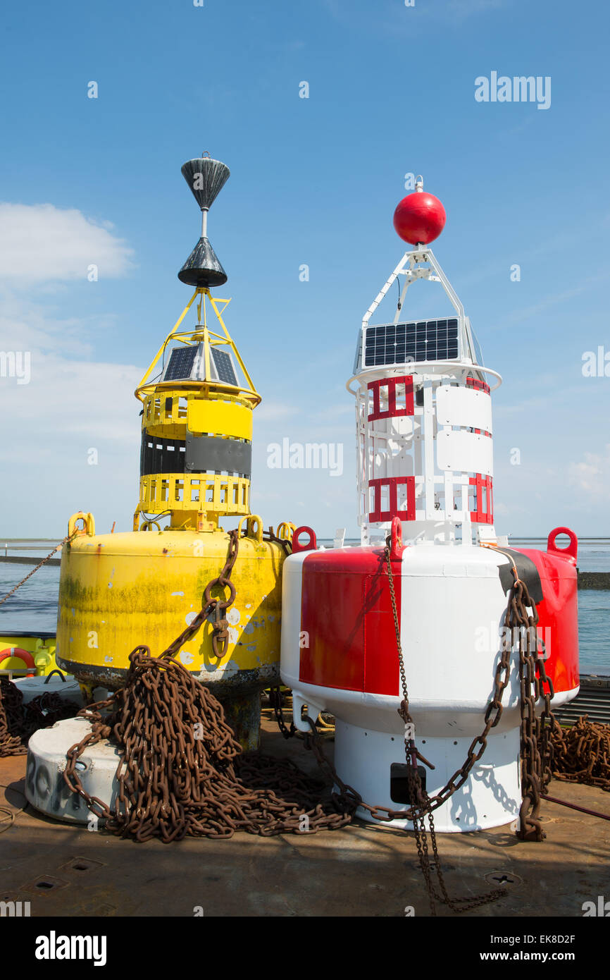 Colorful buoys for navigation in the sea Stock Photo - Alamy