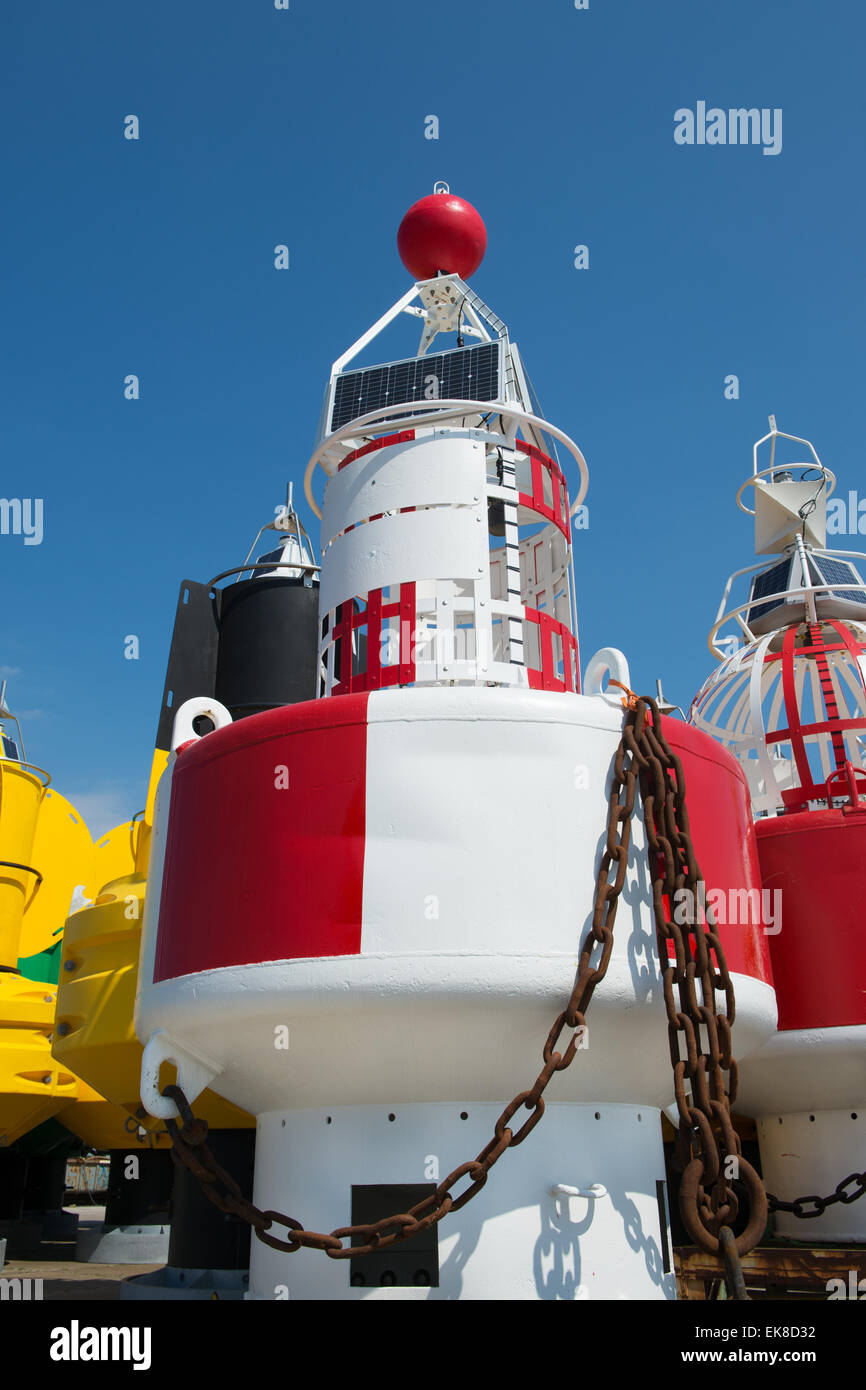 Colorful buoys for navigation in the sea Stock Photo - Alamy
