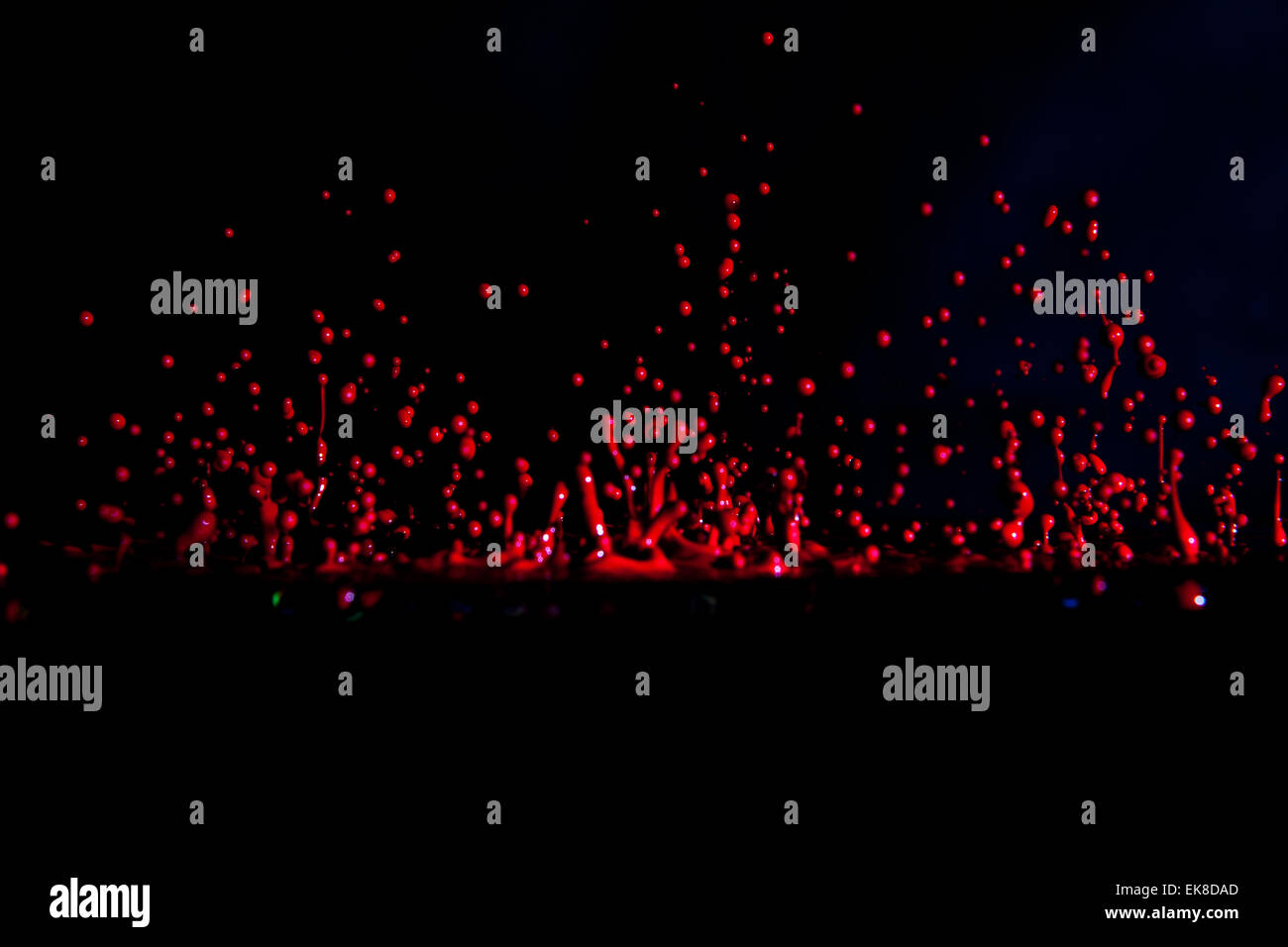 red color paint explosion exploding abstract 3d Stock Photo - Alamy