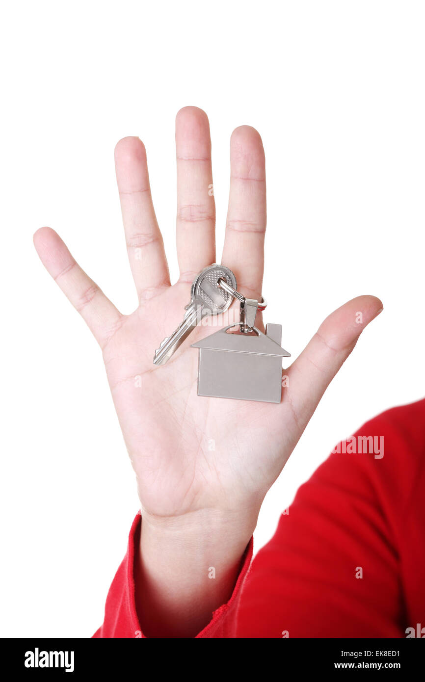 Hand holding a house key Stock Photo - Alamy