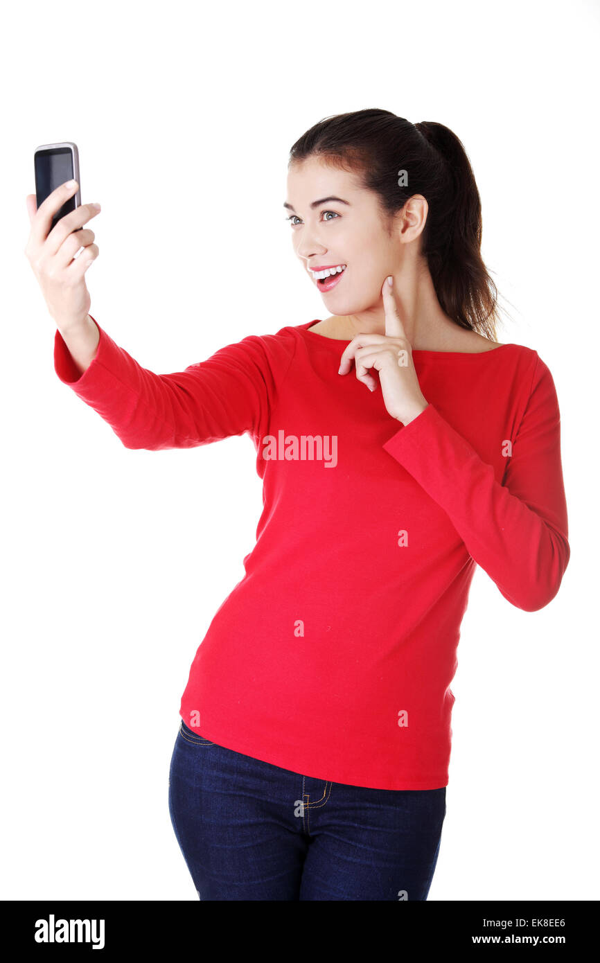 Teen girl using cell phone Stock Photo - Alamy