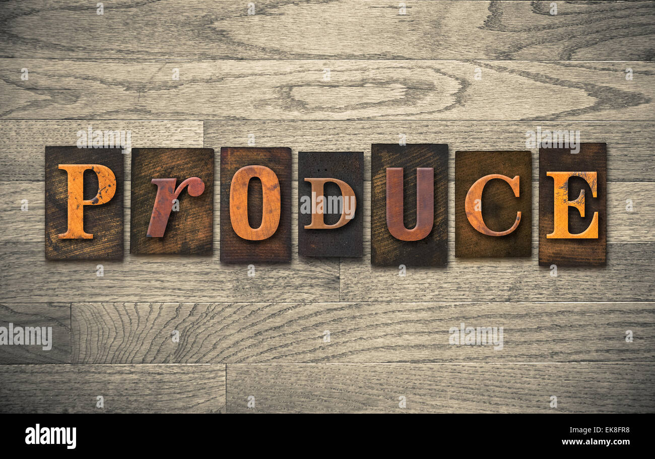 The word "PRODUCE" theme written in vintage, ink stained, wooden ...