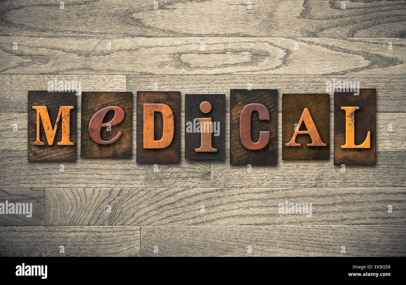 The word "MEDICAL" theme written in vintage, ink stained, wooden ...