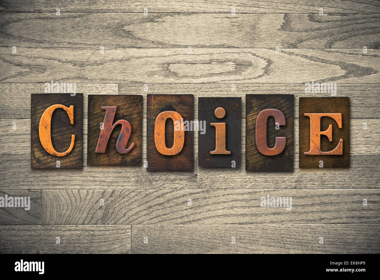 The word "CHOICE" theme written in vintage, ink stained, wooden ...