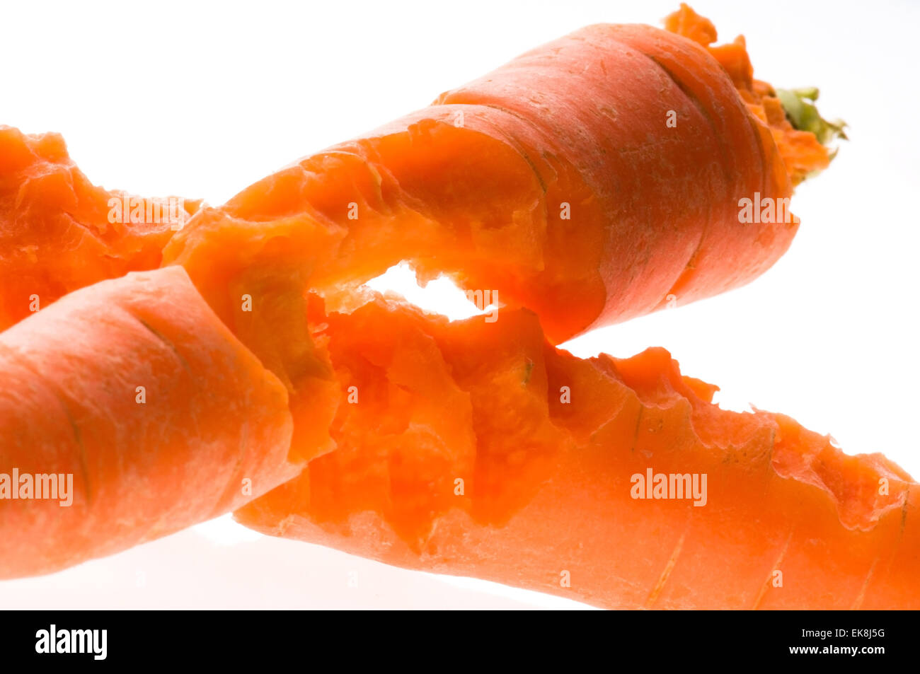 Bite out of a fresh carrot Stock Photo - Alamy