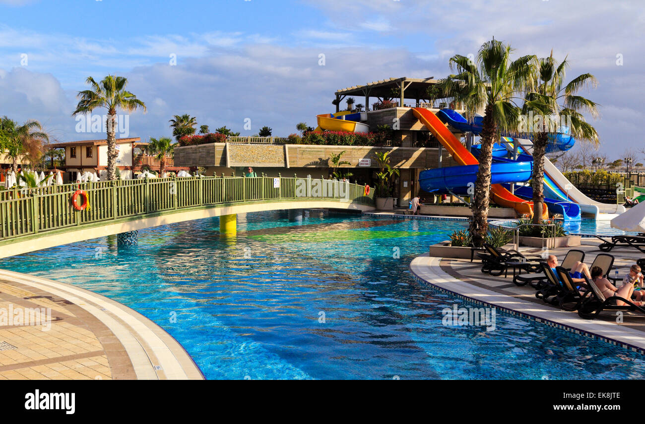 Hotel Swimming Pool with water slide, Colakli, Side, Turkey Stock Photo ...