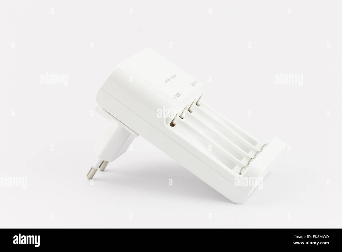 White battery Charger isolated on white background Stock Photo - Alamy