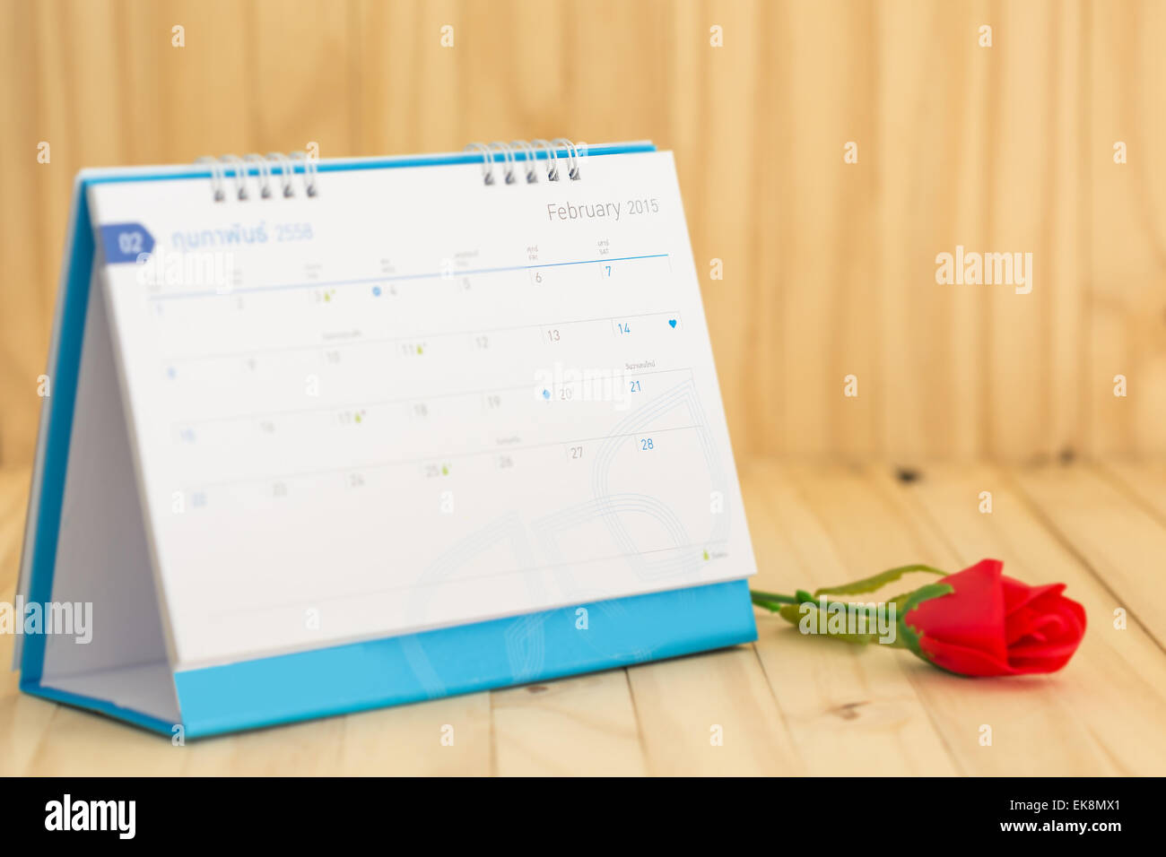Close up Rose and calendar on wooden floor Stock Photo - Alamy