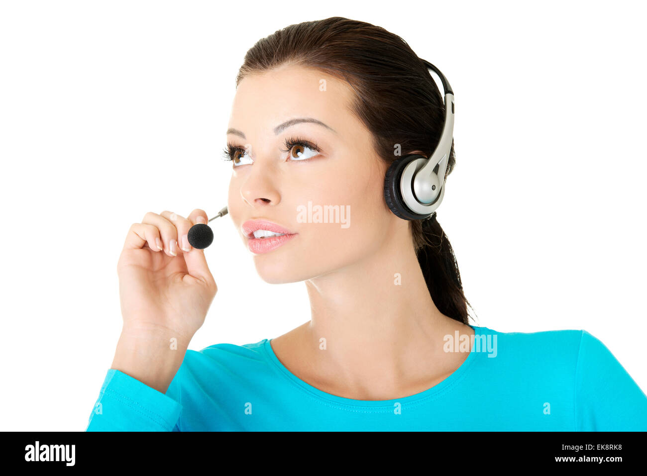 Beautiful young call-center assistant smiling Stock Photo - Alamy