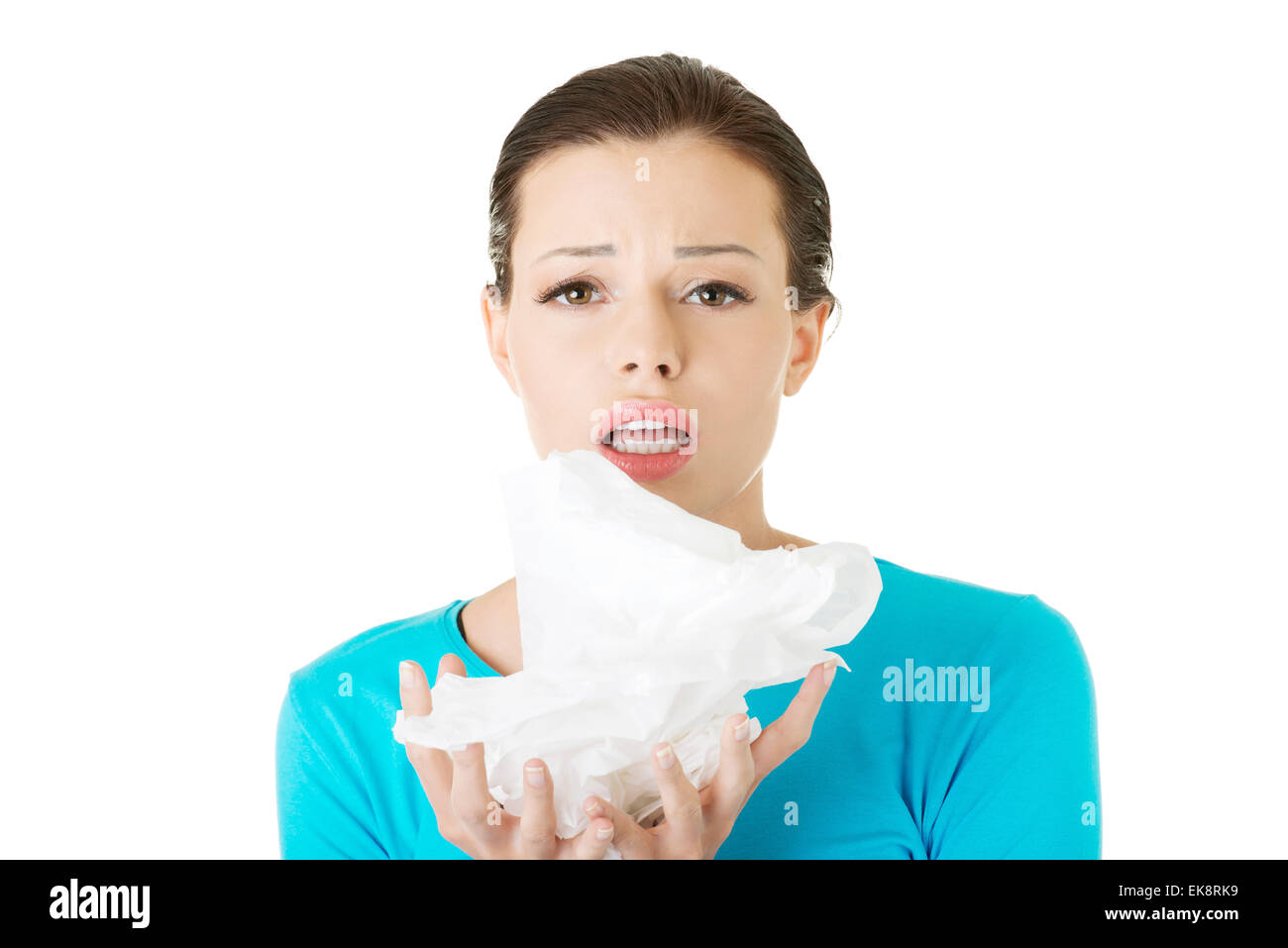 Young woman with tissue - sneezing Stock Photo - Alamy