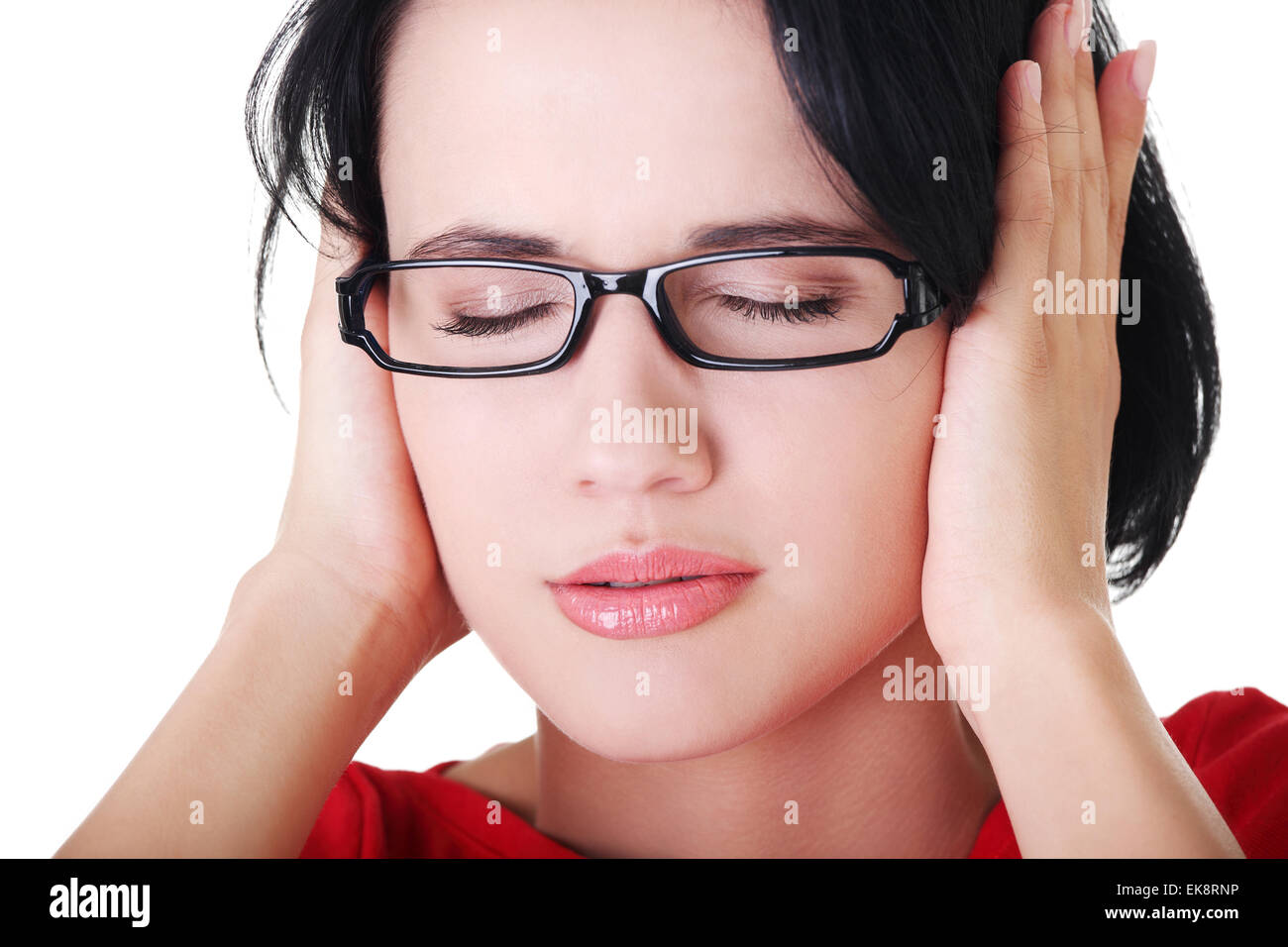Woman holding hand to ear pain hi-res stock photography and images - Alamy