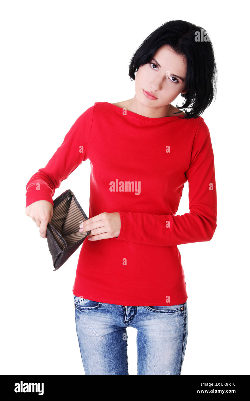 Young woman shows her empty wallet Stock Photo - Alamy