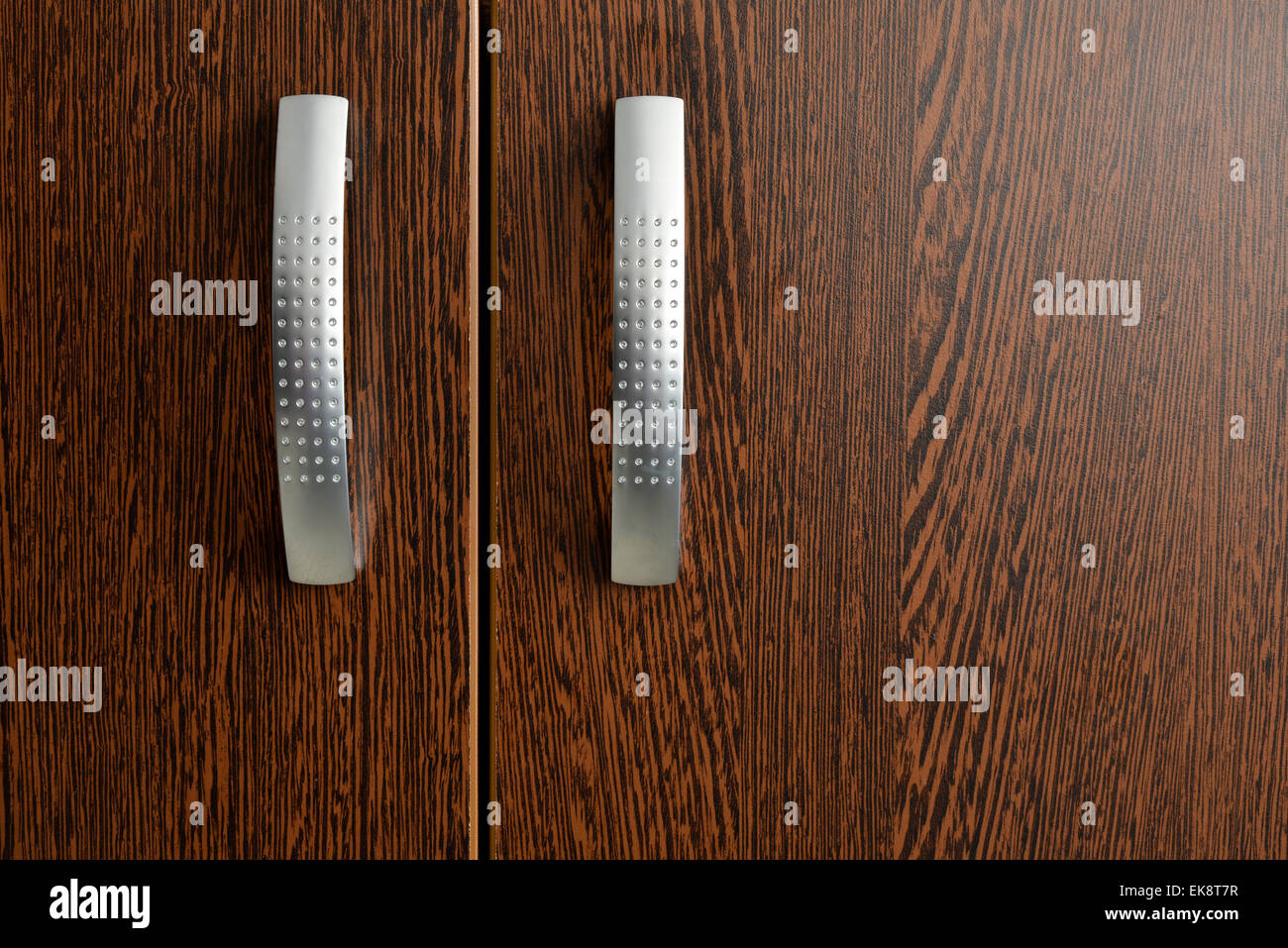 Isolated cabinet handles Stock Photo - Alamy