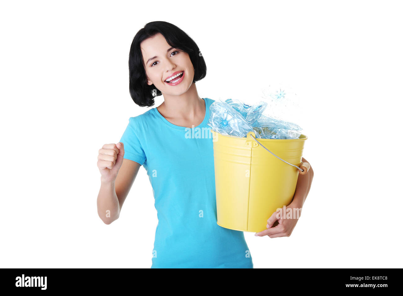 Beautiful young woman holding recycling bin Stock Photo - Alamy