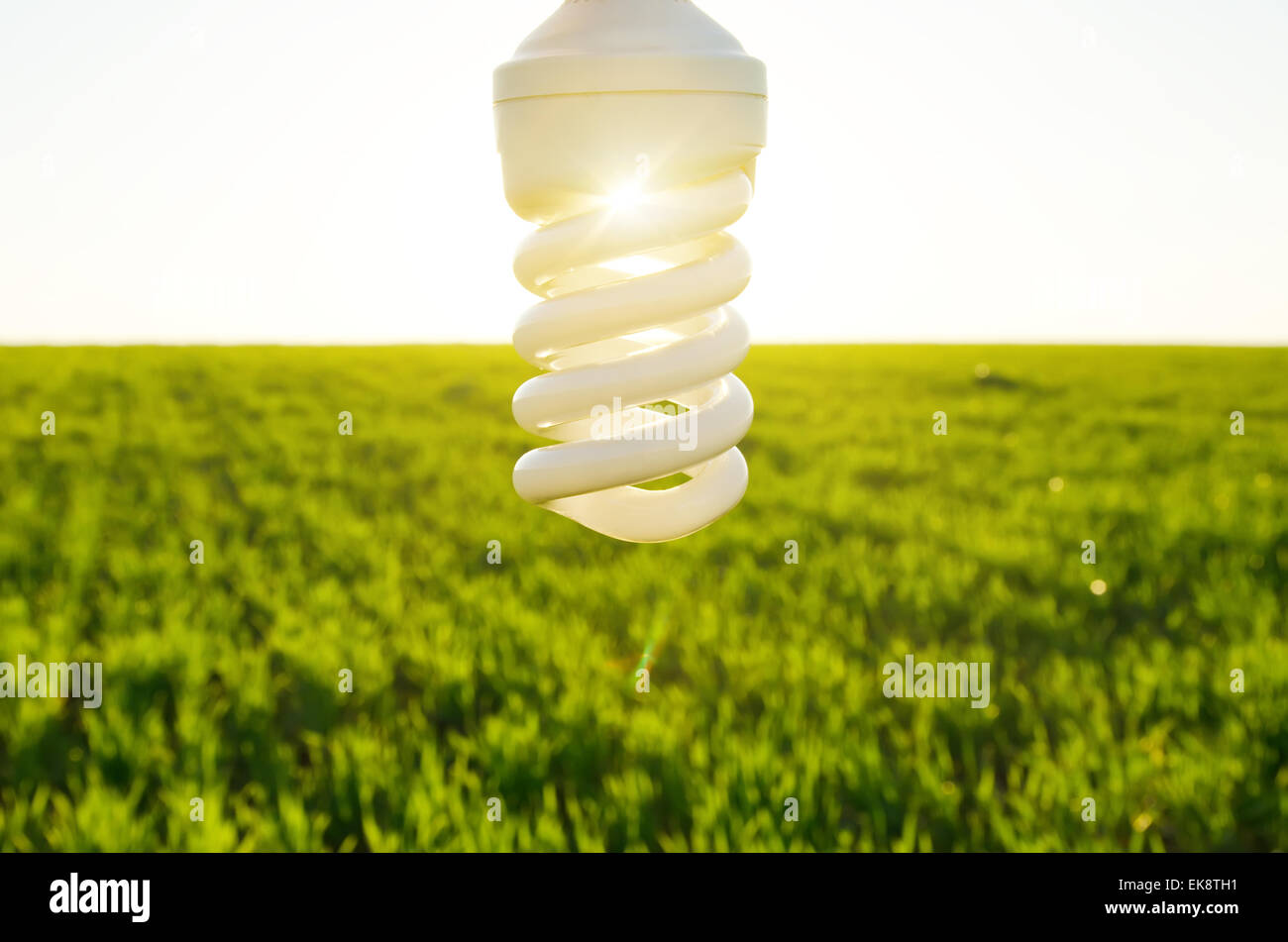 sunrays through energy saving lamp Stock Photo - Alamy