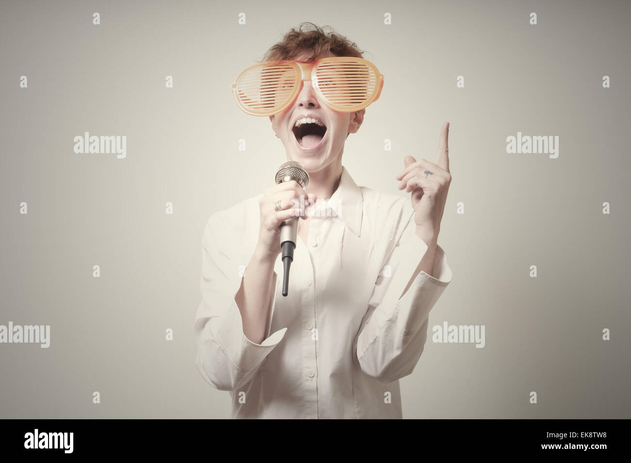 Funny woman singing hi-res stock photography and images - Alamy