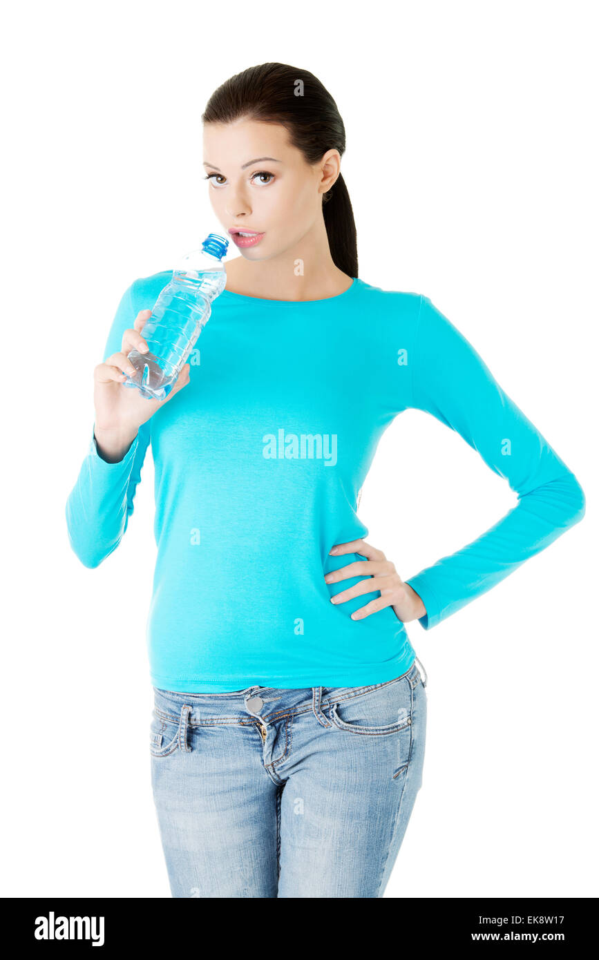 Woman with bottle of mineral water Stock Photo - Alamy
