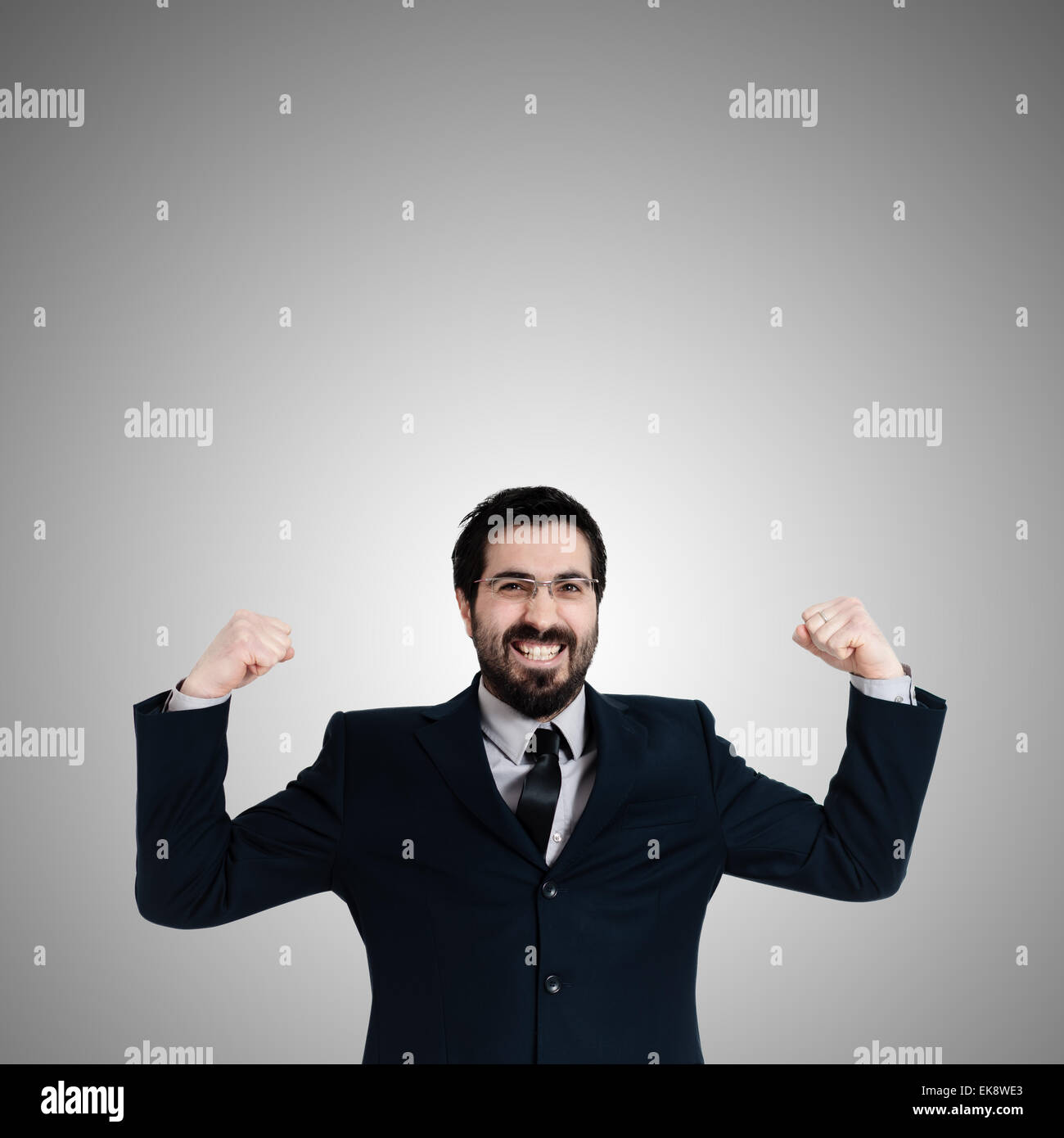 strong business man flexing muscle Stock Photo - Alamy