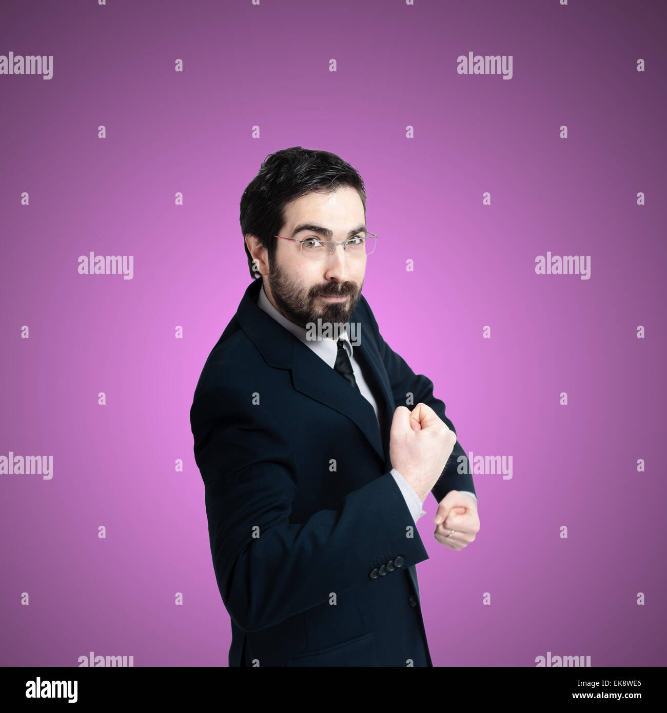 Strong business man flexing muscle hi-res stock photography and images ...