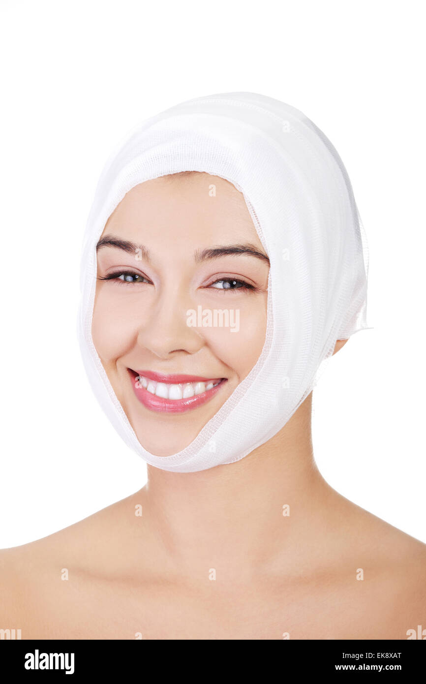 Portrait of beautiful young female face with bandage Stock Photo - Alamy