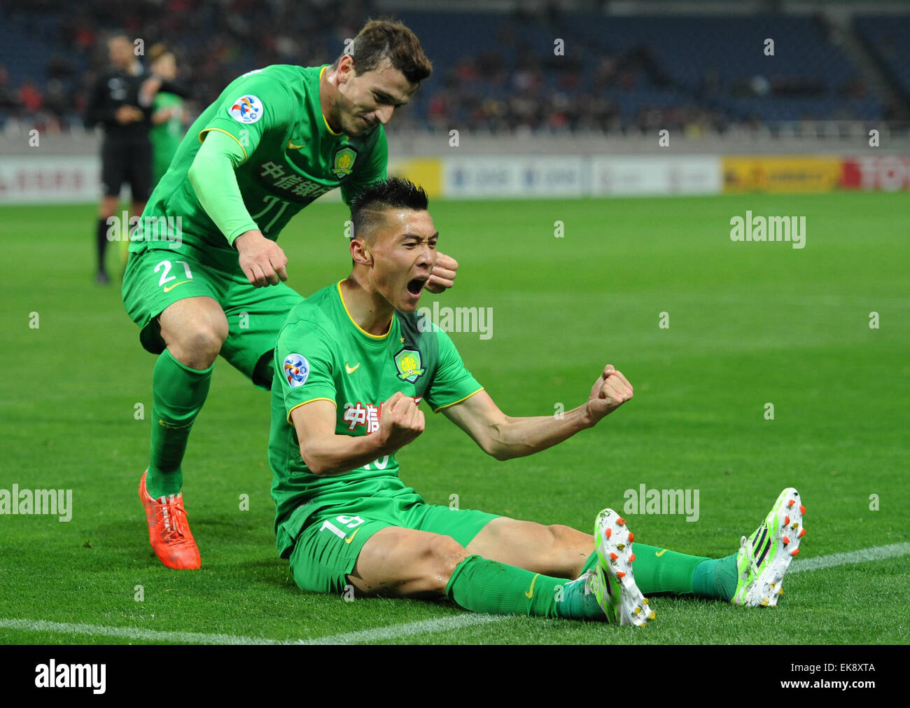 Saitama, Japan. 8th Apr, 2015. Yu Dabao (R) of China's Beijing Guoan ...