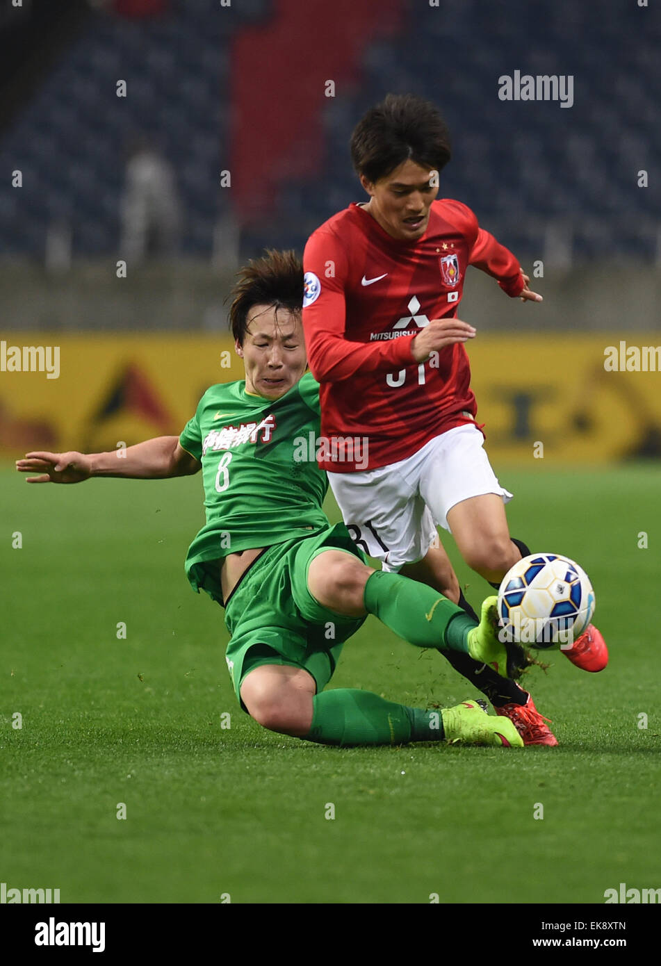 Saitama, Japan. 8th Apr, 2015. Piao Cheng (L) of China's Beijing Guoan ...