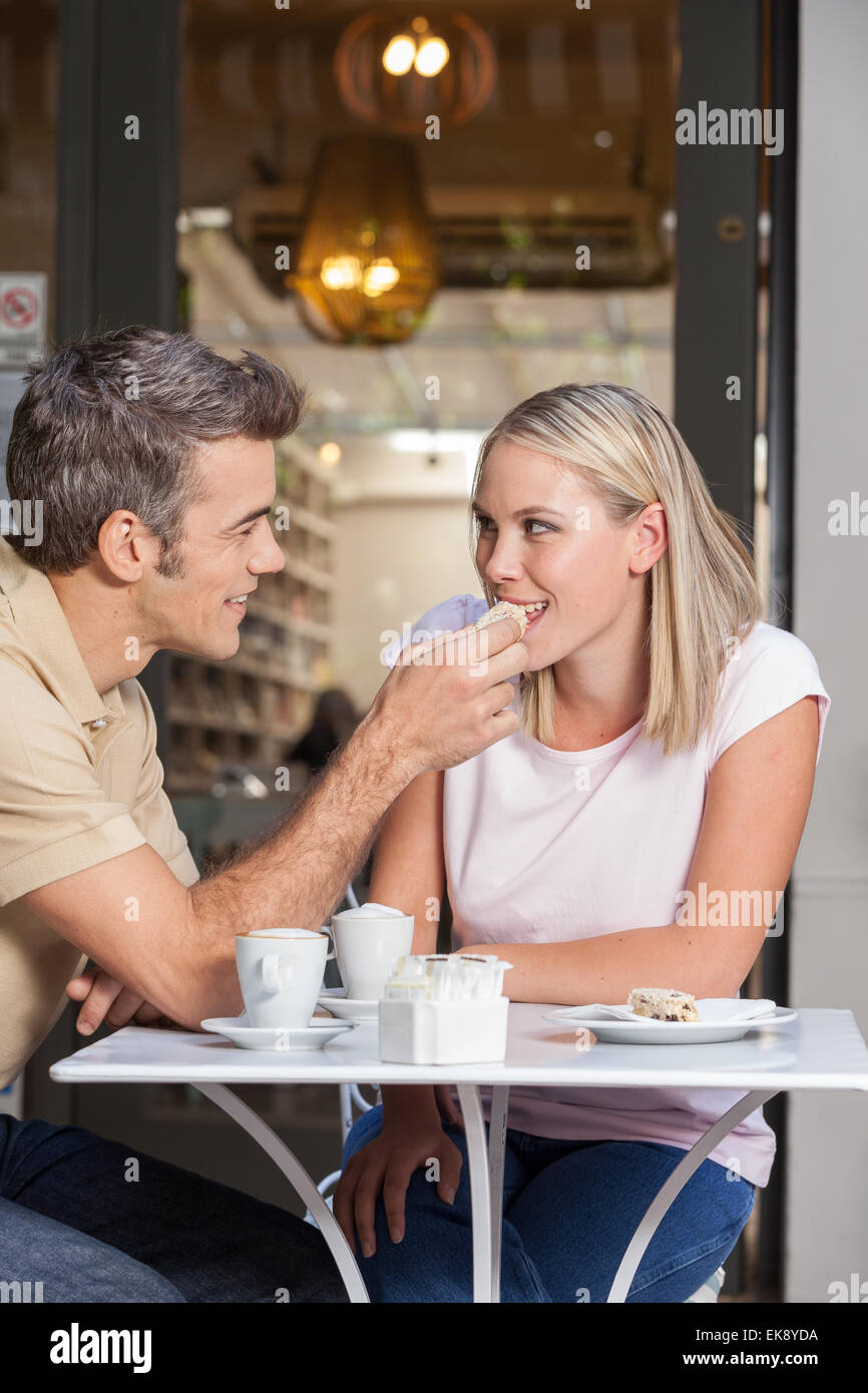 Couple in love drinking a coffee Stock Photo - Alamy