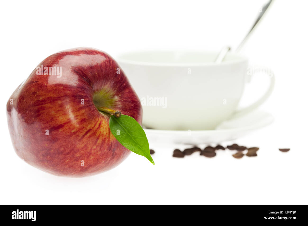 apple and a cup isolated on white Stock Photo - Alamy