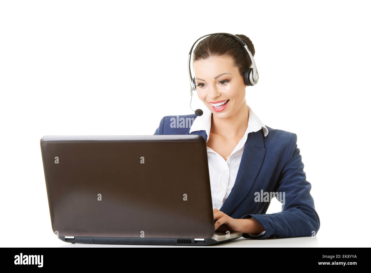 Beautiful young call-center assistant at the desk Stock Photo - Alamy