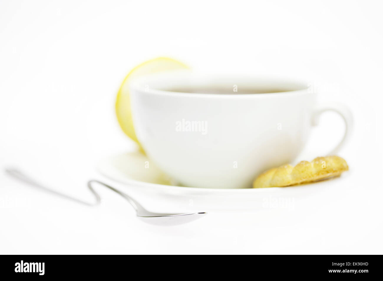 white cup and lemon isolated on white Stock Photo - Alamy