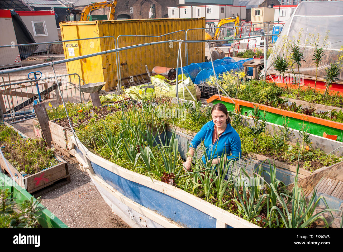 London, UK. 8th April, 2015. Volunteer, Kat Goodman, tends vegetables ...
