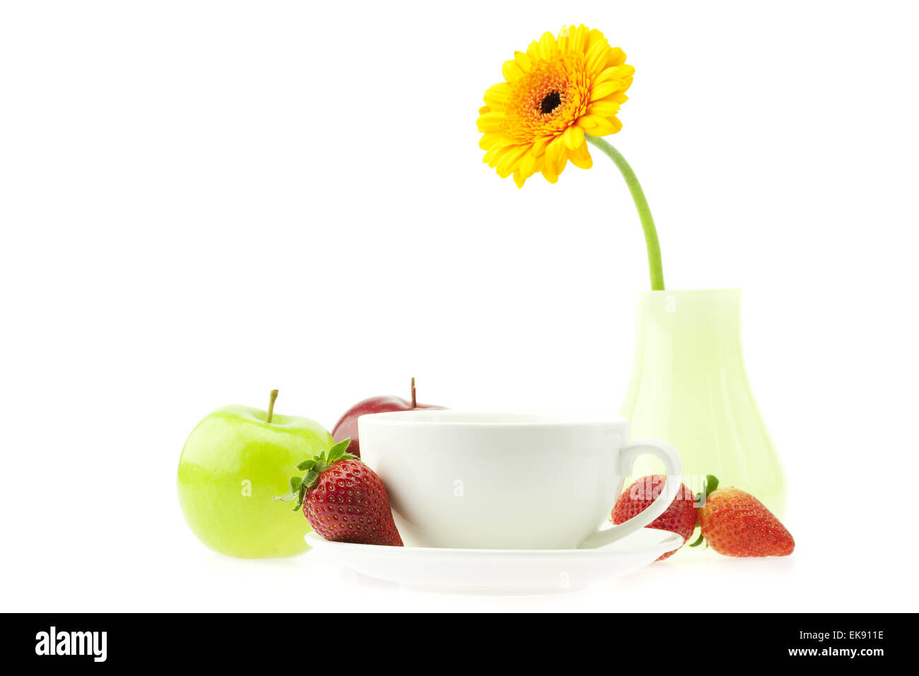 still life of gerbera cups and apples isolated on white Stock Photo - Alamy