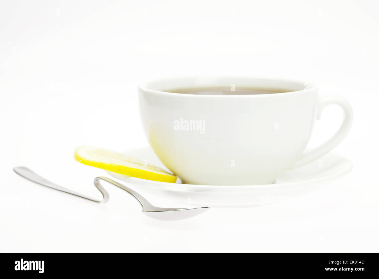cup and lemon isolated on white Stock Photo - Alamy