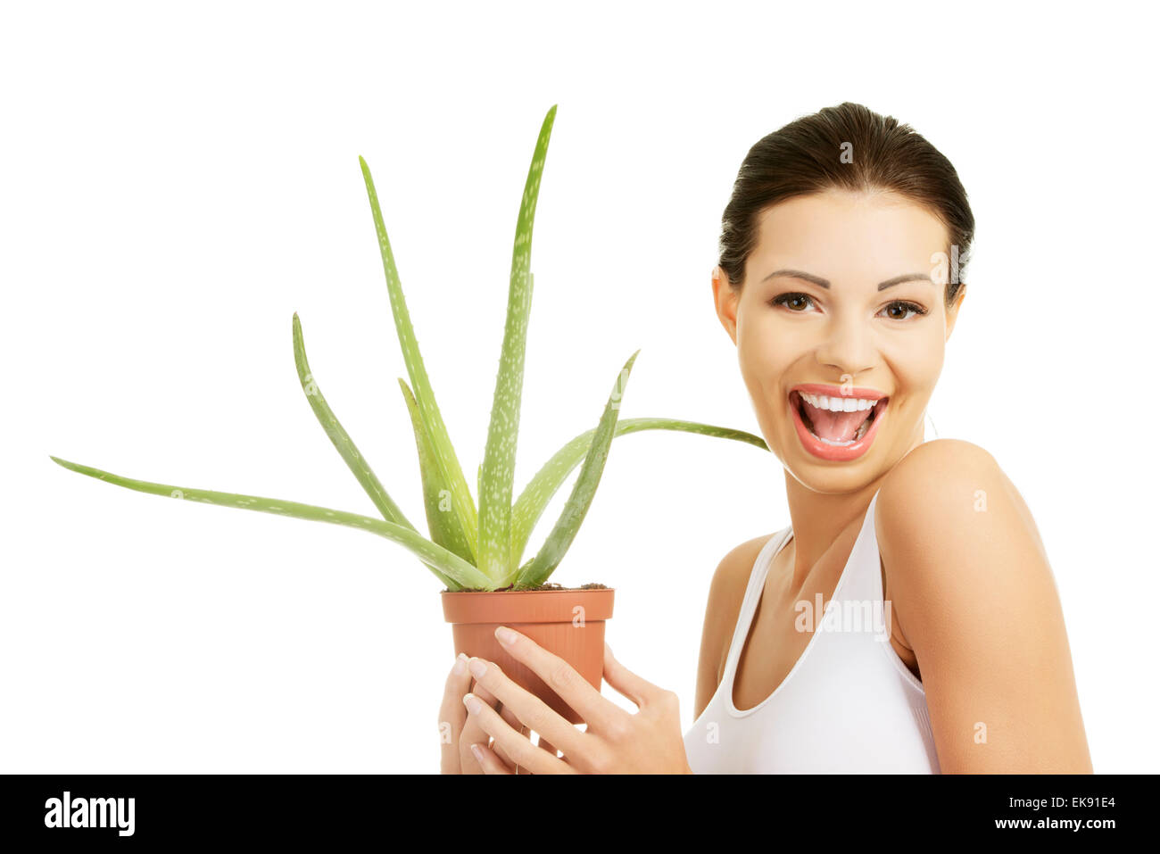 Young beautiful woman's face and aloe vera Stock Photo - Alamy