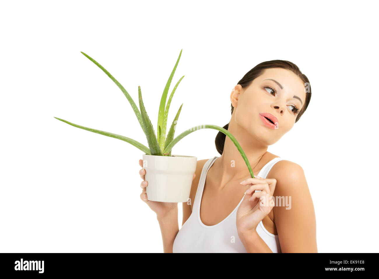 Young beautiful woman's face and aloe vera Stock Photo - Alamy