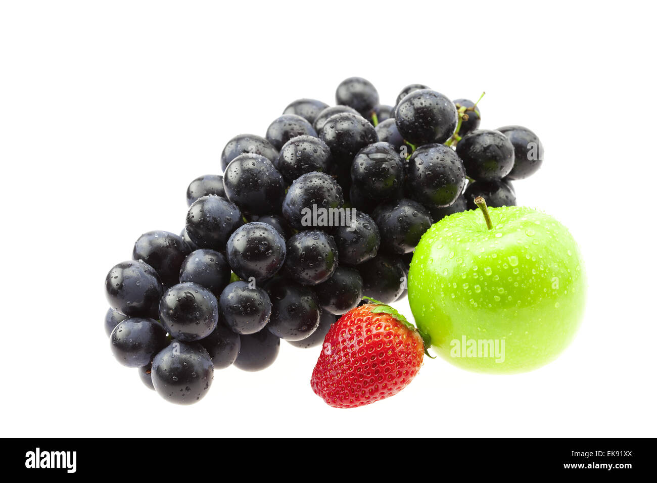 grape apple and strawberry isolated on white Stock Photo - Alamy