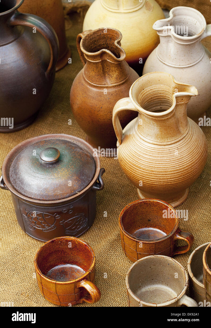 earthenware jars standing on linen rag Stock Photo - Alamy