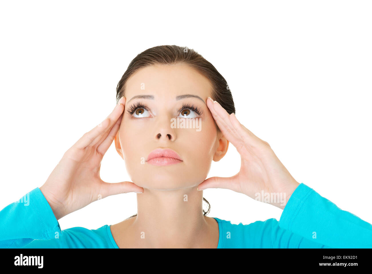 Thoughtful female student looking up Stock Photo - Alamy