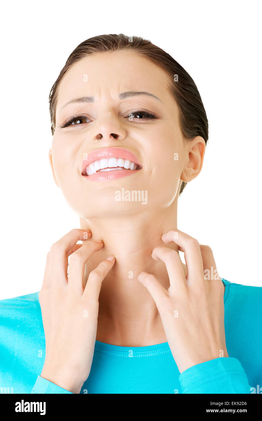 Young beautiful woman scratching her self Stock Photo - Alamy