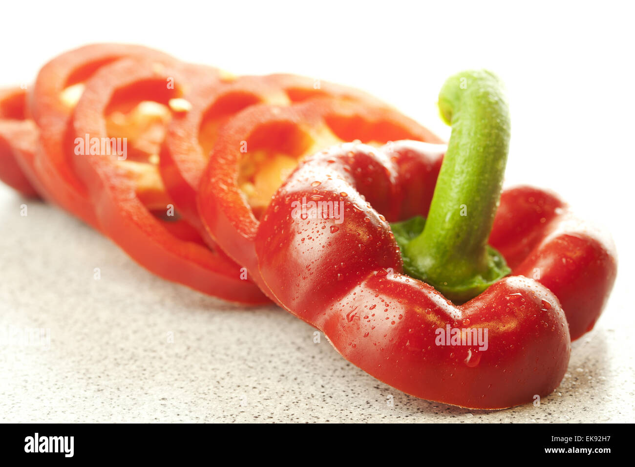 chopped red bell pepper isolated on white Stock Photo - Alamy