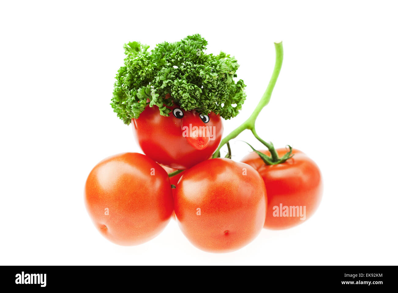 tomato with a nose and a bunch of tomato isolated on white Stock Photo ...