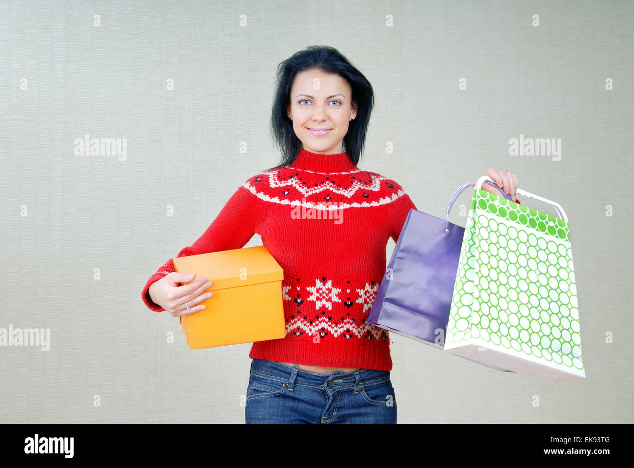 Woman with gift packages Stock Photo - Alamy