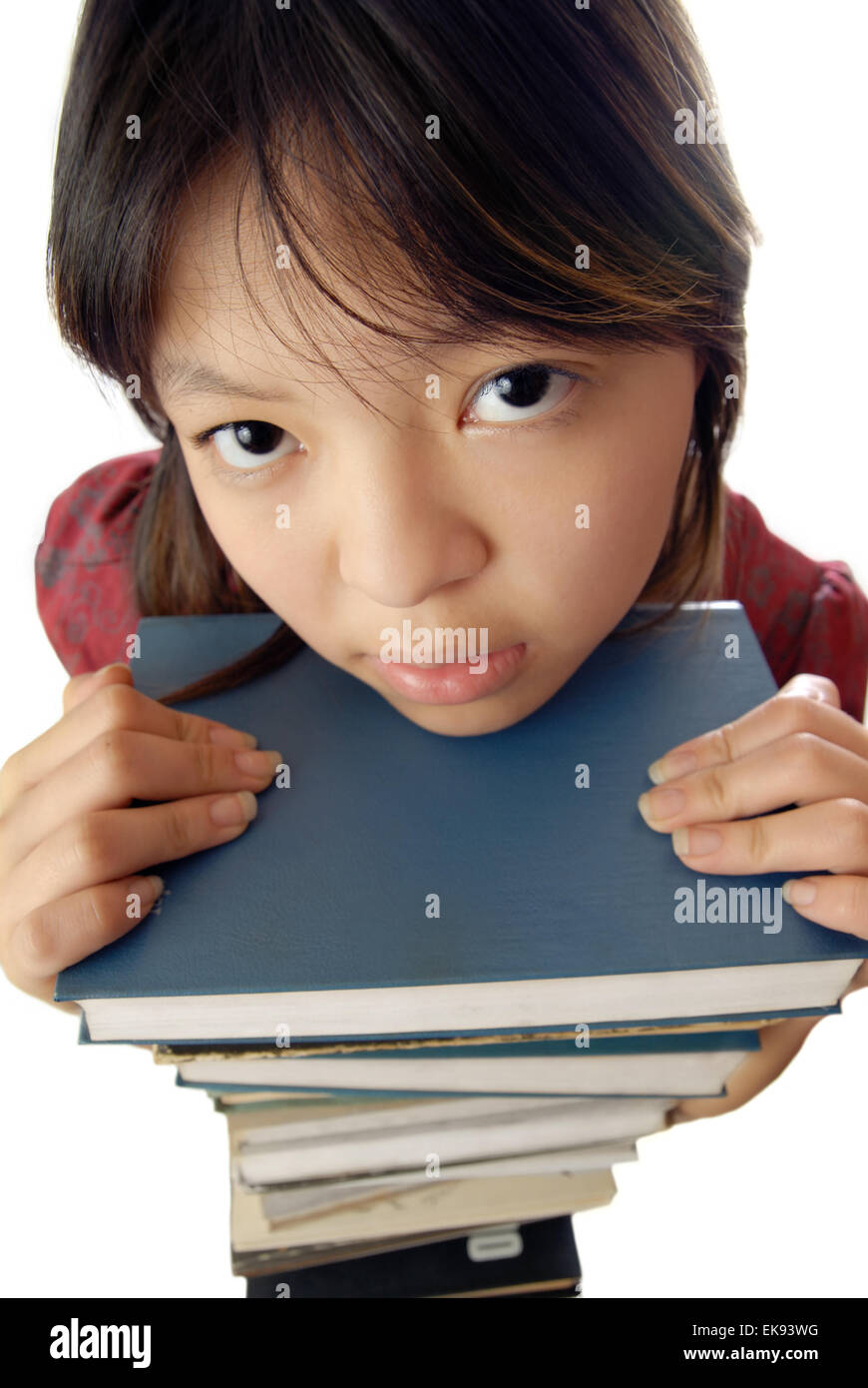 Pretty girl and stack of books Stock Photo - Alamy